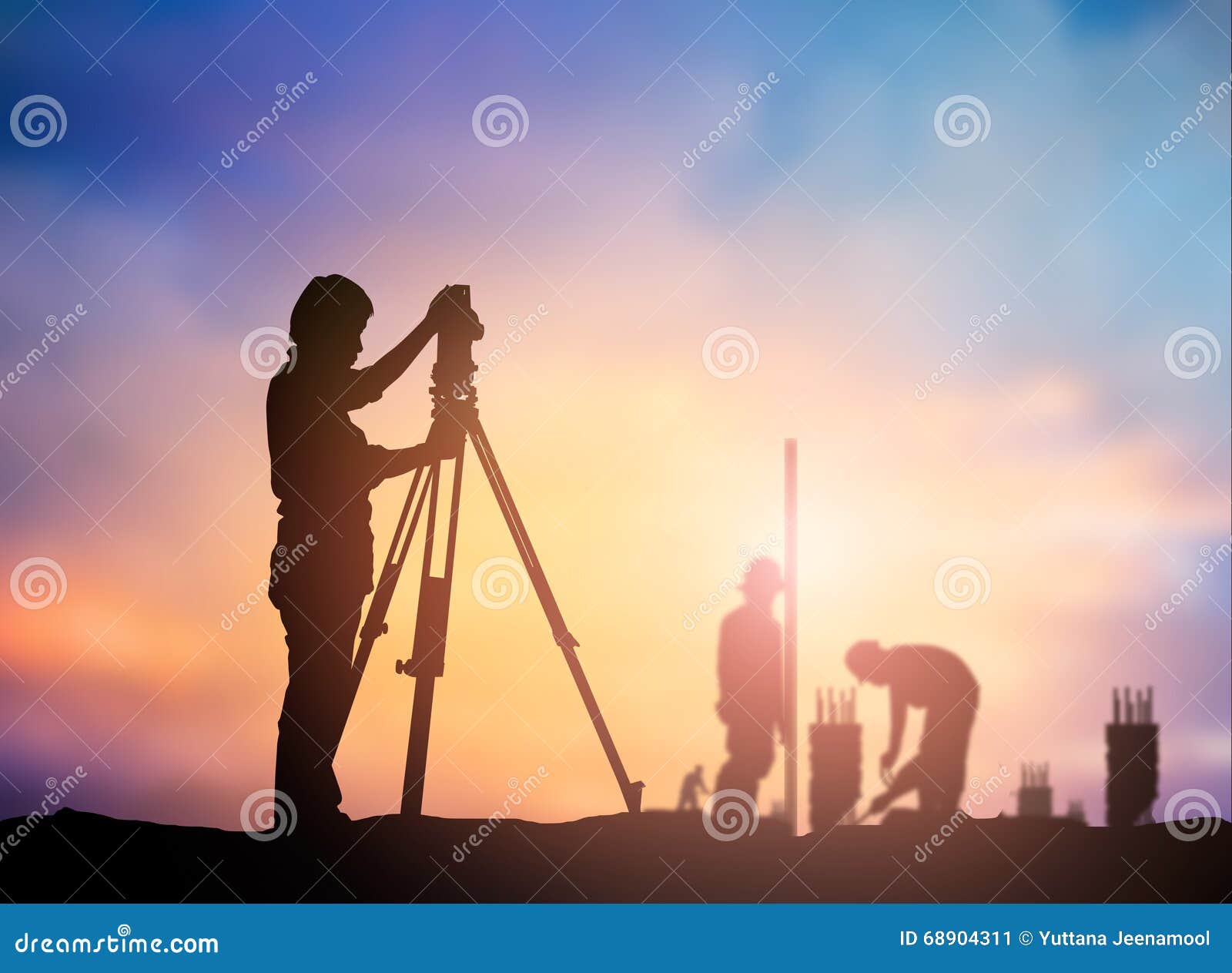 Silhouette Survey Engineer Working in a Building Site Over Blur Stock ...