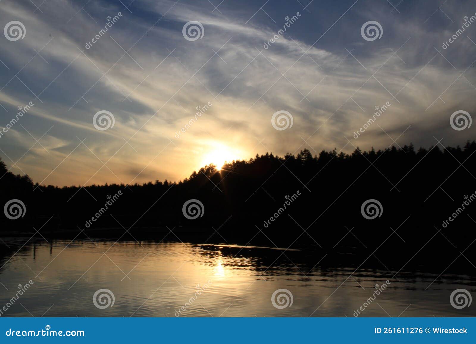 Silhouette of Trees by a Mirror Lake on the Sunset Stock Photo - Image ...