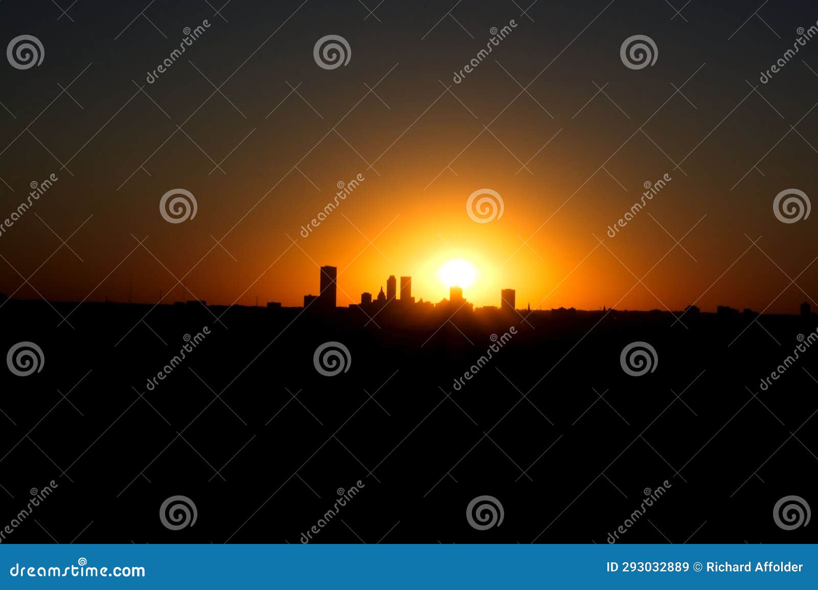 Silhouette of the Tulsa Skyline Stock Image - Image of sunlight, glow ...