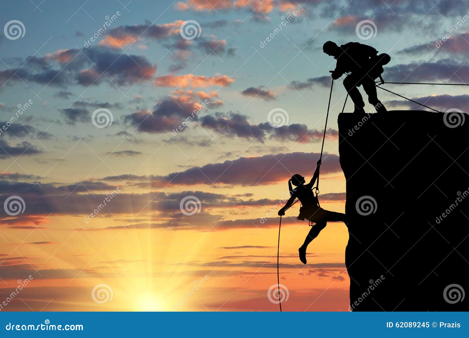 Silhouette of two climbers stock image. Image of topman - 62089245