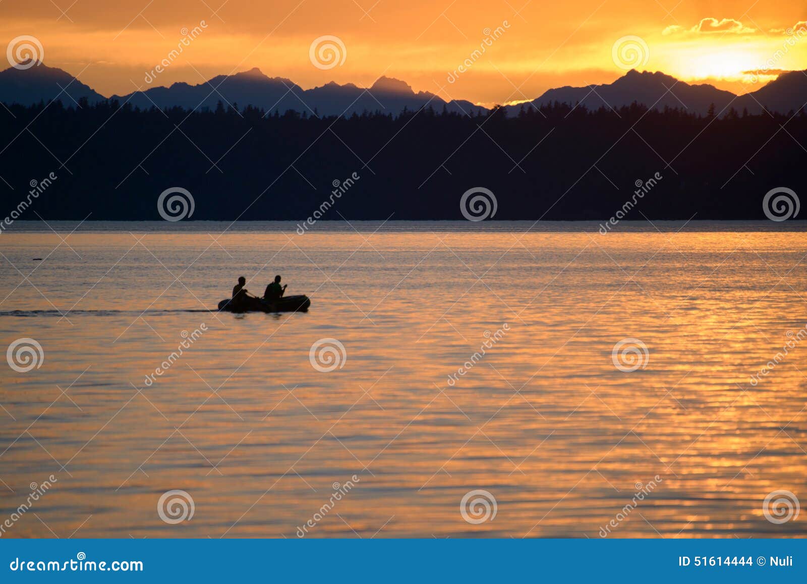 Silhouette of Two Men Rowing in a Boat at Sunset Stock Photo - Image of ...
