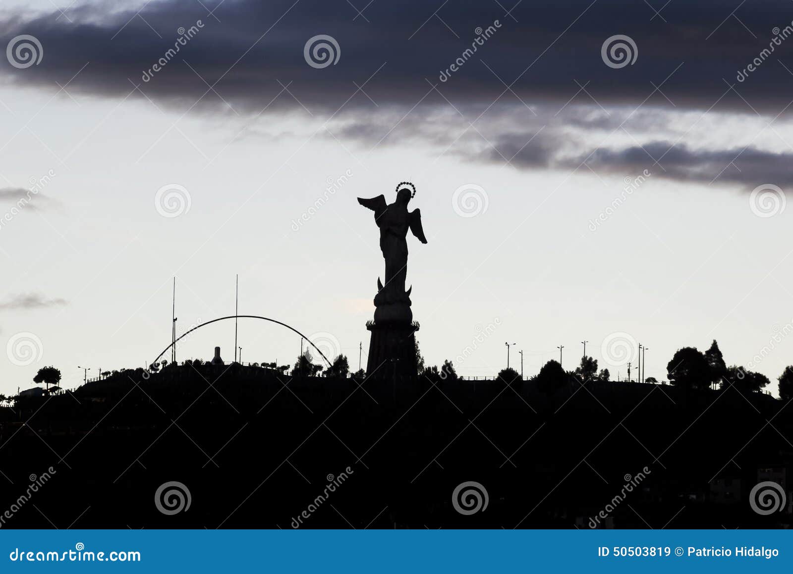 Silhouette of the Virgin of Panecillo at Sunset Stock Image - Image of ...
