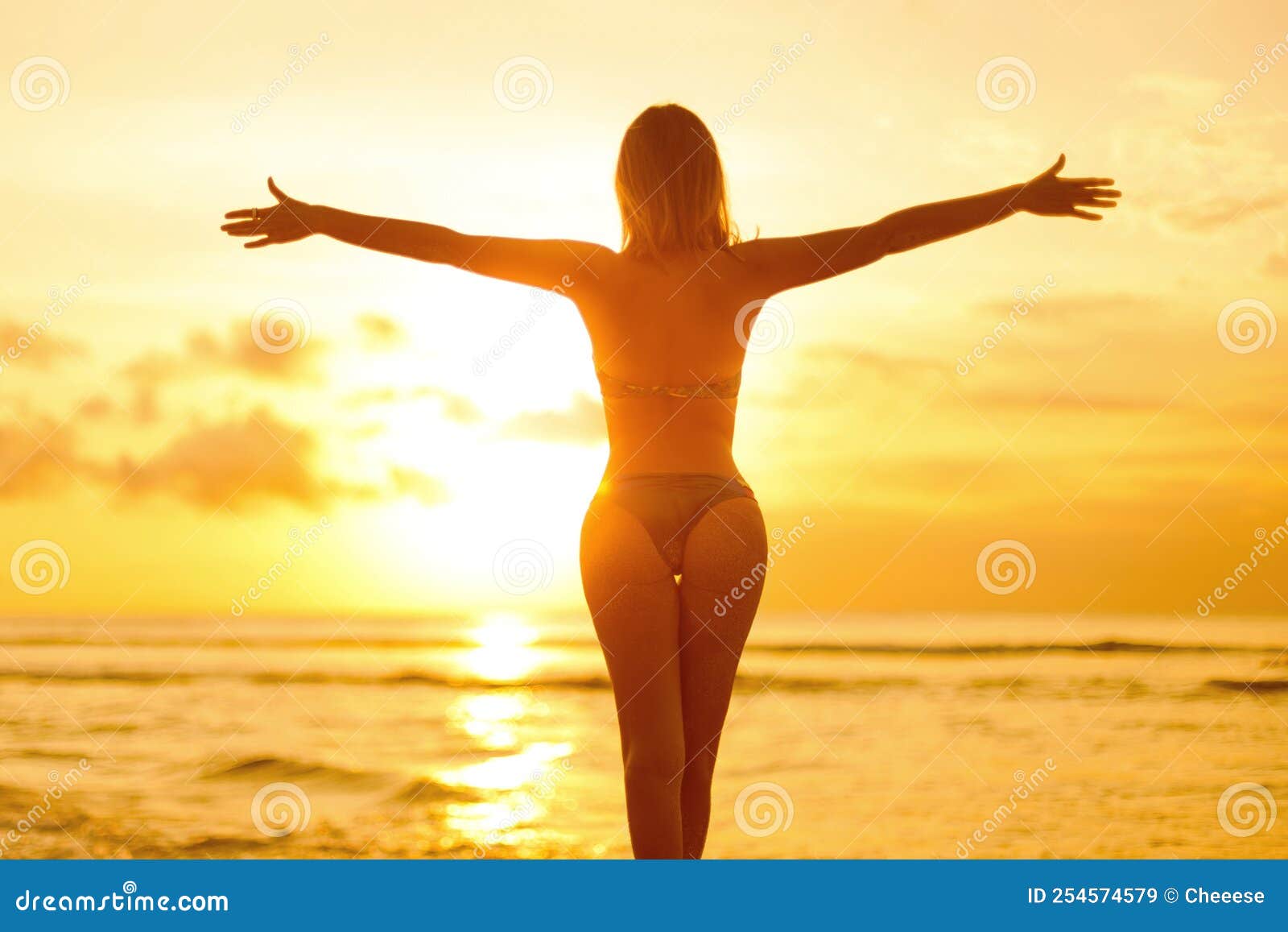 Silhouette of a Woman Raising Hands Up on the Beach Stock Image - Image ... Silhouette of a Woman Raising Hands Up on the Beach Stock Image - Image ...