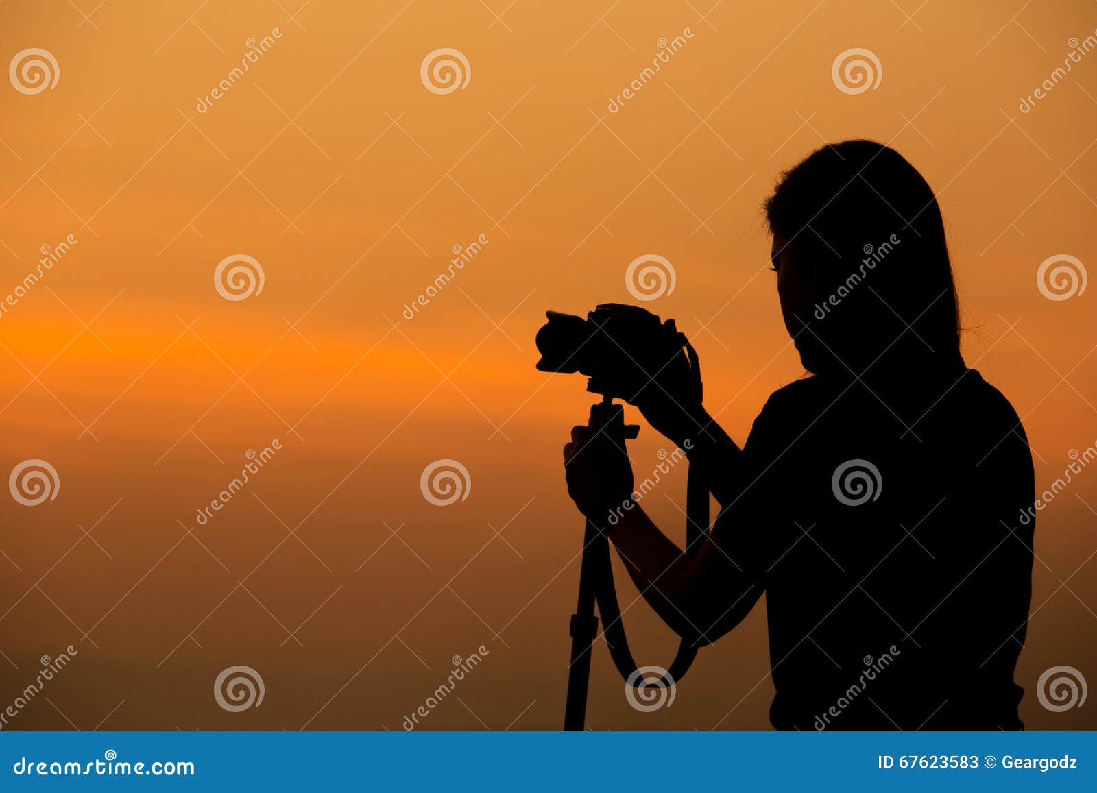 Silhouette of Woman Shooting with Camera at Sunset Stock Image - Image ...