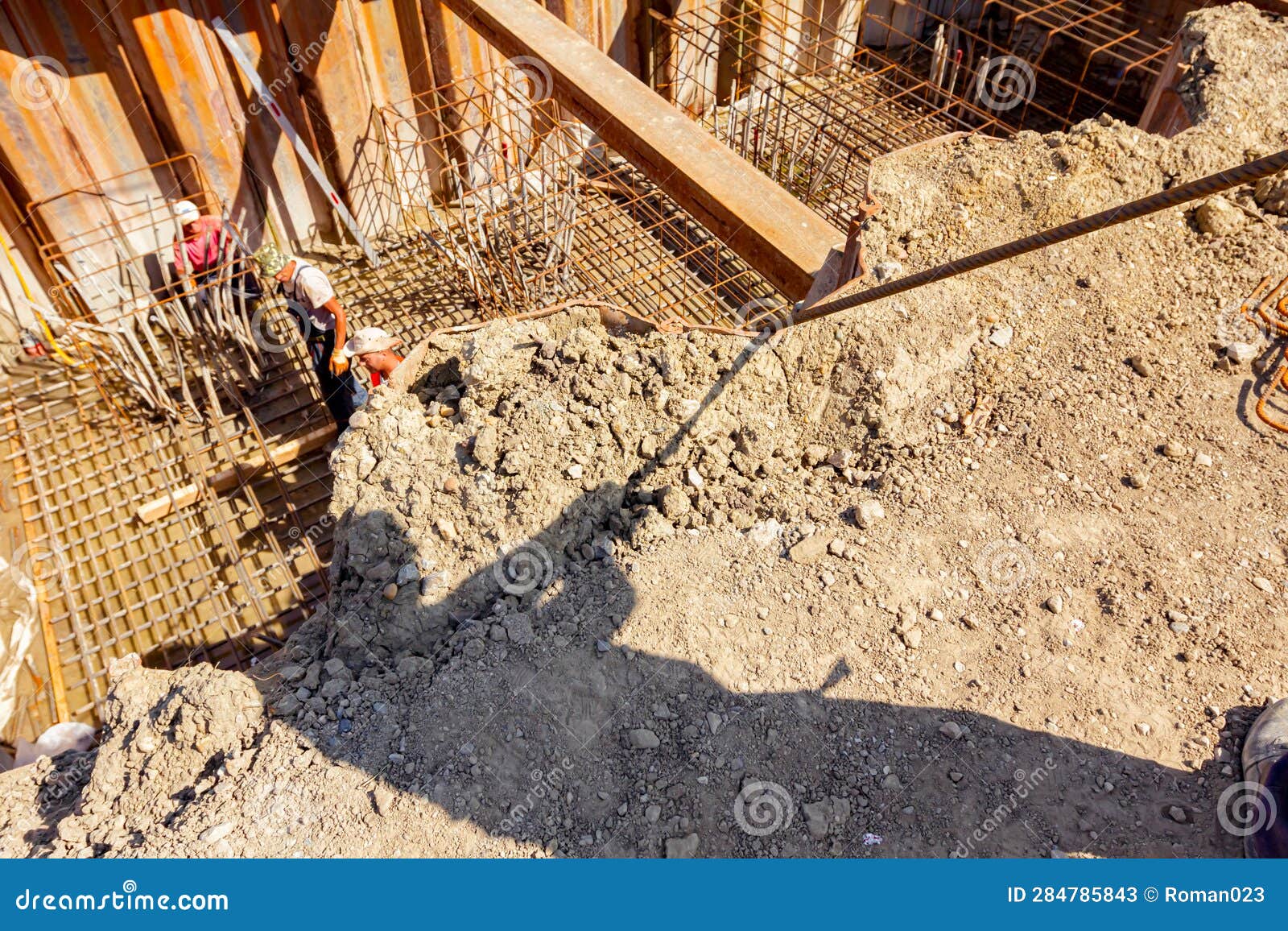 Silhouette of Worker with Rebar Rod Installing Skeleton of Reinforcing ... Silhouette of Worker with Rebar Rod Installing Skeleton of Reinforcing ...