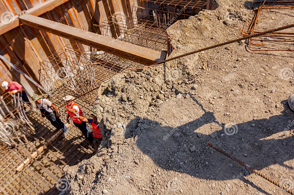 Silhouette of Worker with Rebar Rod Installing Skeleton of Reinforcing ... Silhouette of Worker with Rebar Rod Installing Skeleton of Reinforcing ...