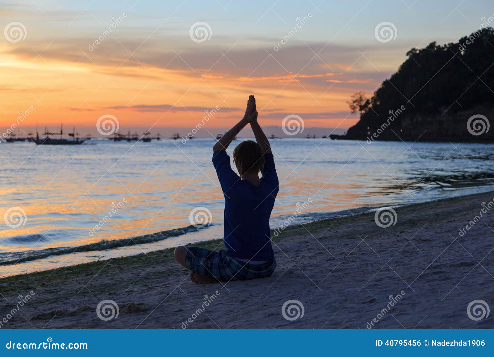 Silhouette of Young Man Doing Yoga at Sunset Stock Photo - Image of ...