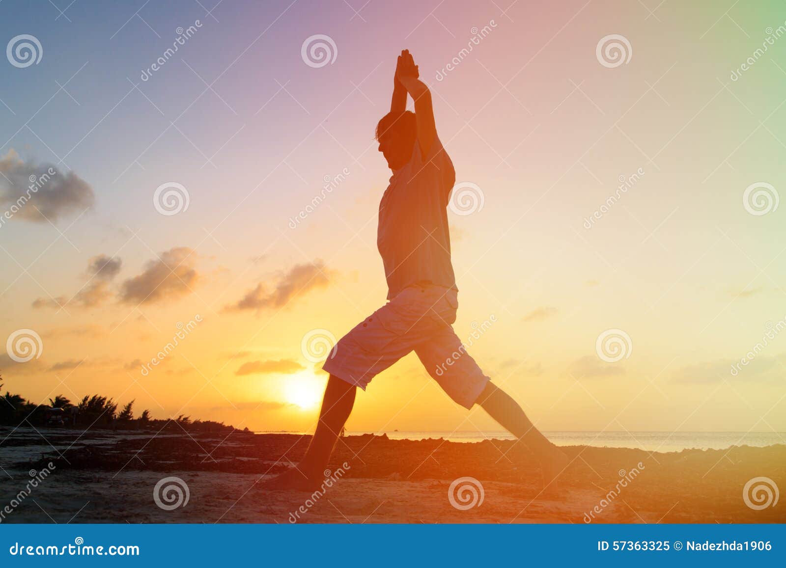 Silhouette of Young Man Doing Yoga at Sunset Stock Image - Image of ...
