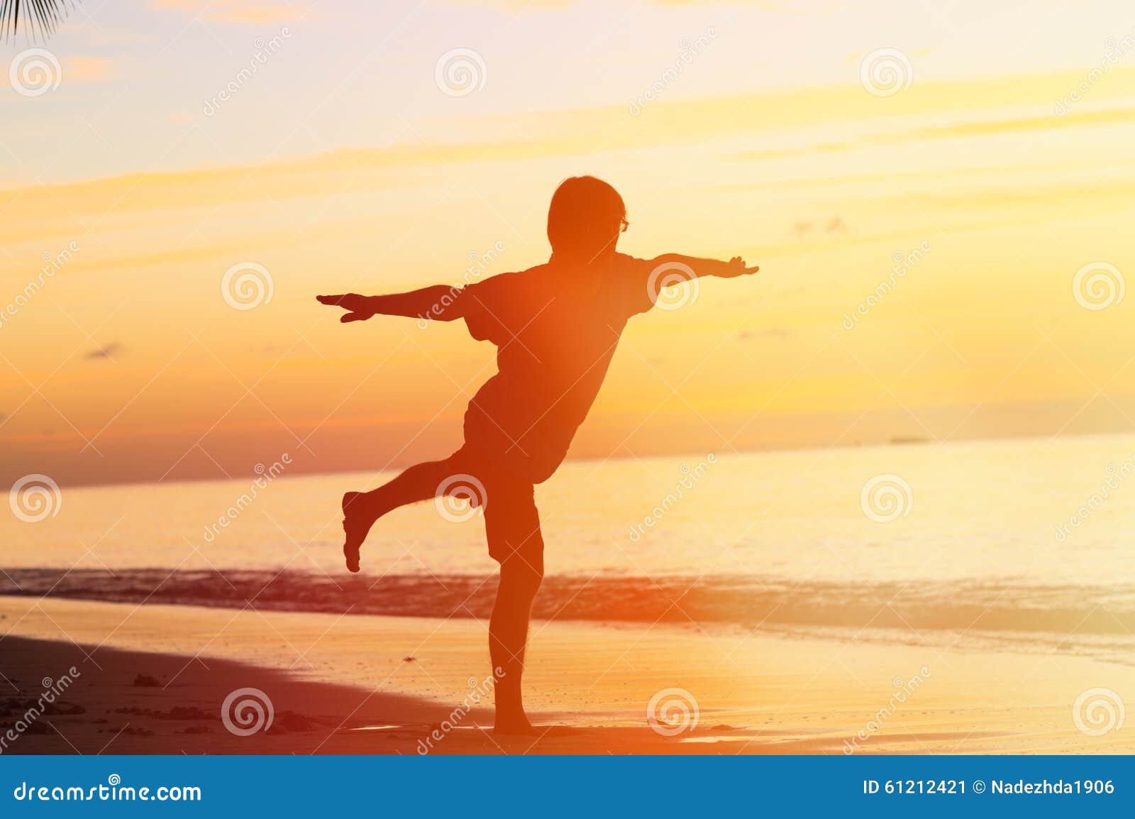 Silhouette of Young Man Doing Yoga at Sunset Stock Image - Image of ...
