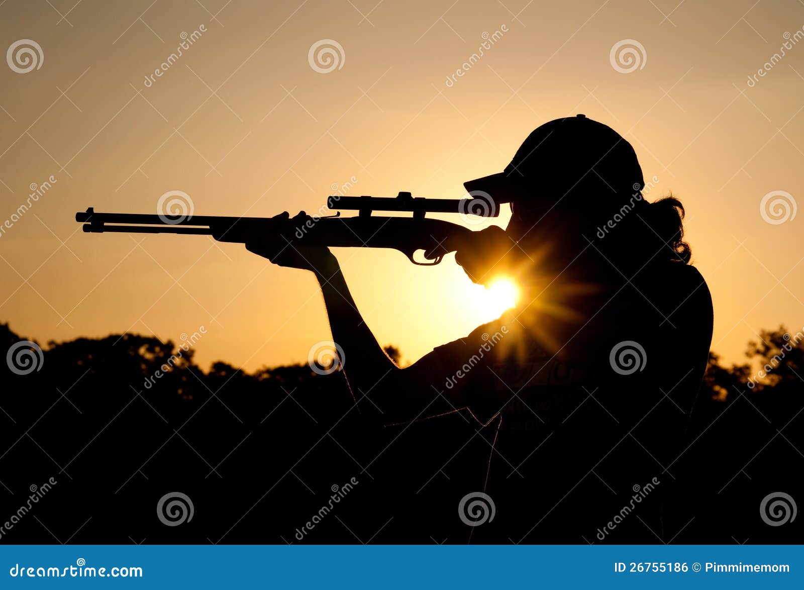 Silhouette of a Young Man Shooting with a Rifle Stock Photo - Image of ...