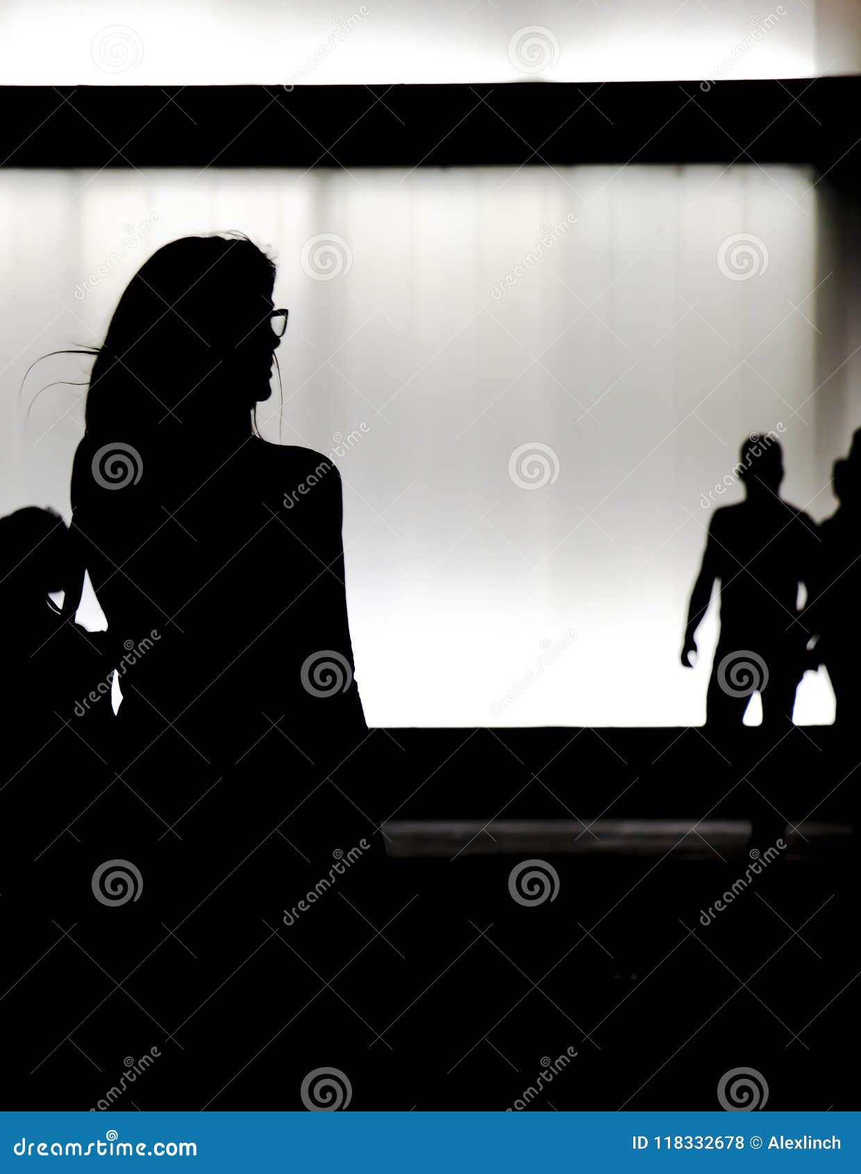 Silhouette of a Young Woman Walking Alone in the Night Stock Photo ... Silhouette of a Young Woman Walking Alone in the Night Stock Photo ...