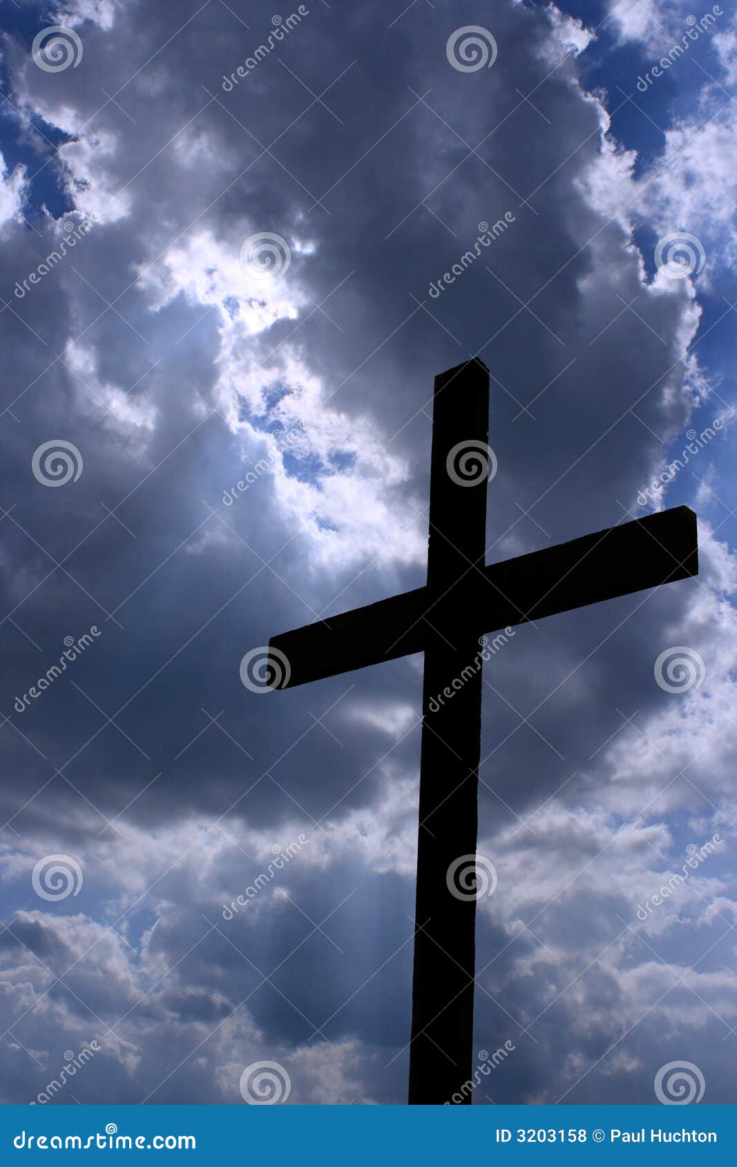 Silhouetted Cross and Blue Sky Stock Photo - Image of blue, clouds: 3203158