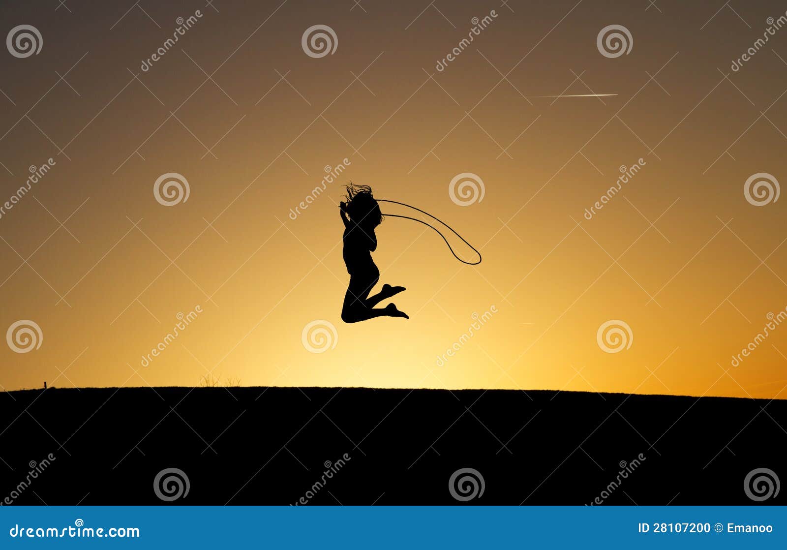 Silhouetted Girl Rope Skipping in Sunset Stock Photo - Image of jump ...