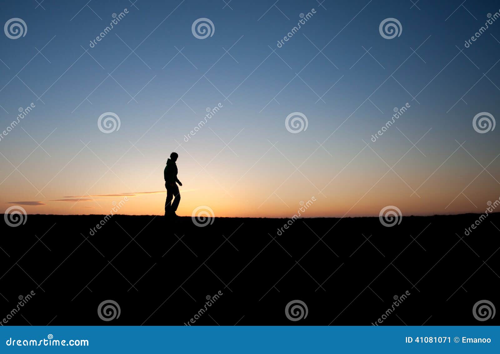 Silhouetted man in sunset stock image. Image of adventure - 41081071