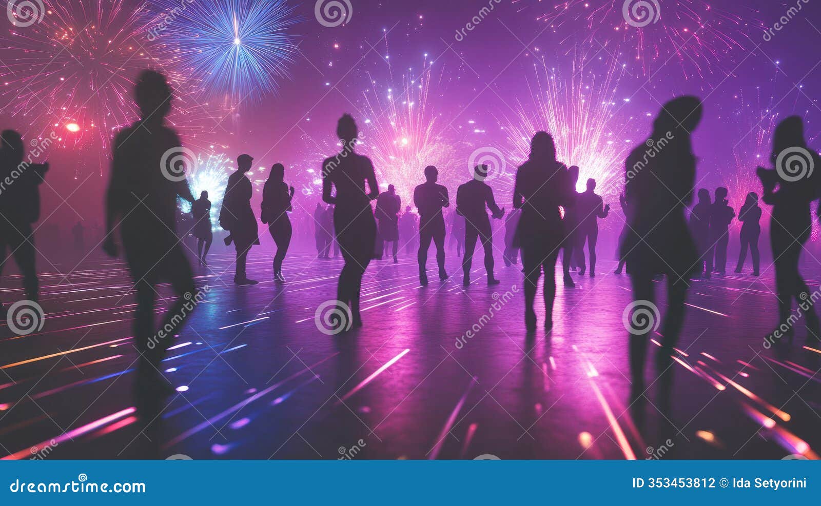 Silhouetted People Dancing at a Vibrant Nighttime Event with Fireworks ...