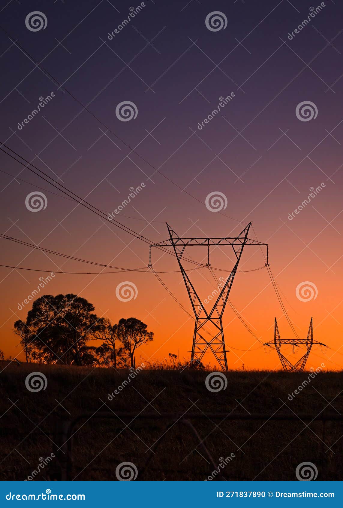 Silhouetted Power Line Pylons Against a Sunset Stock Photo - Image of ...