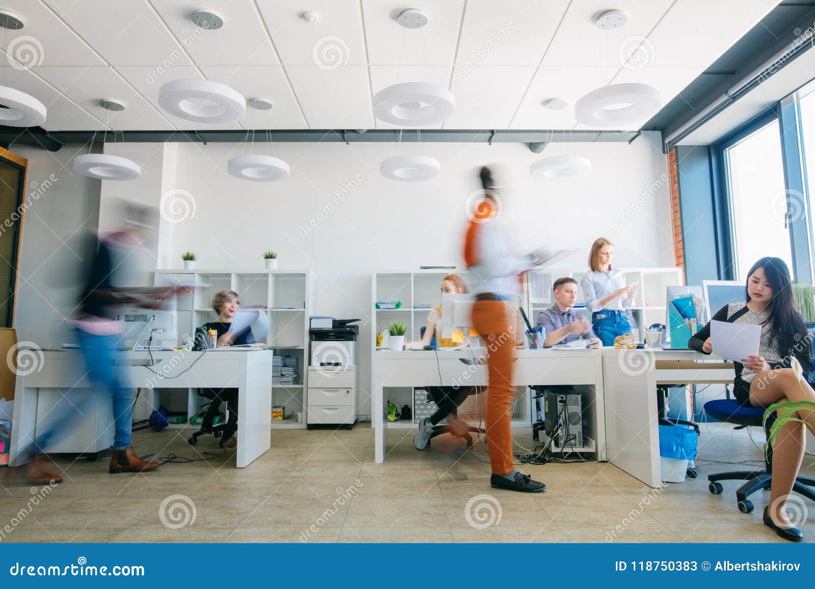 Silhouettes of Active Workers at Workplace Stock Image - Image of blur ...