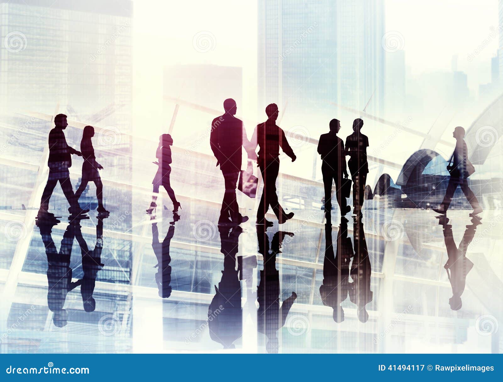 Silhouettes of Business People Walking Inside the Office Stock Image ...
