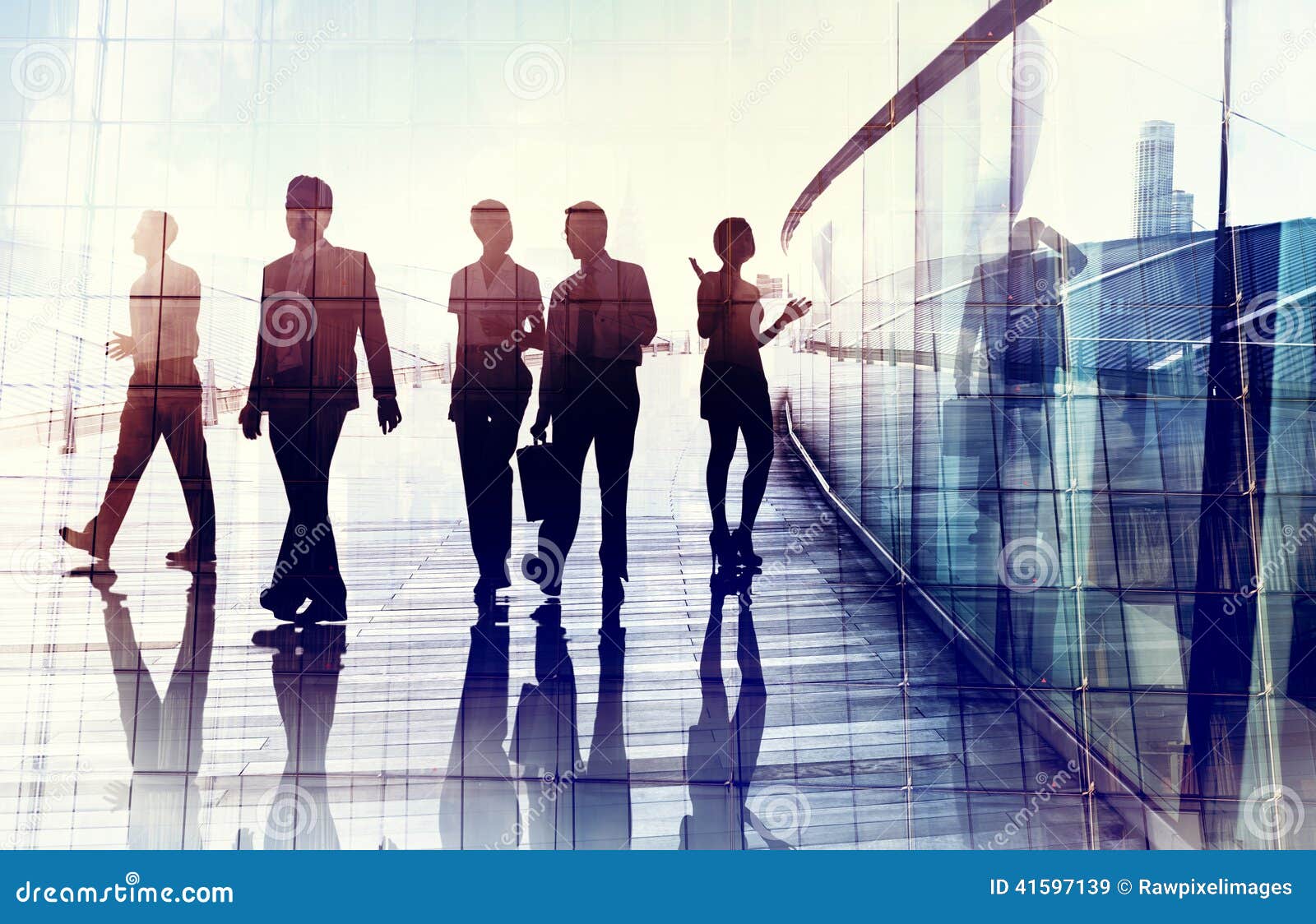 Silhouettes of Business People Walking in the Office Stock Image ...