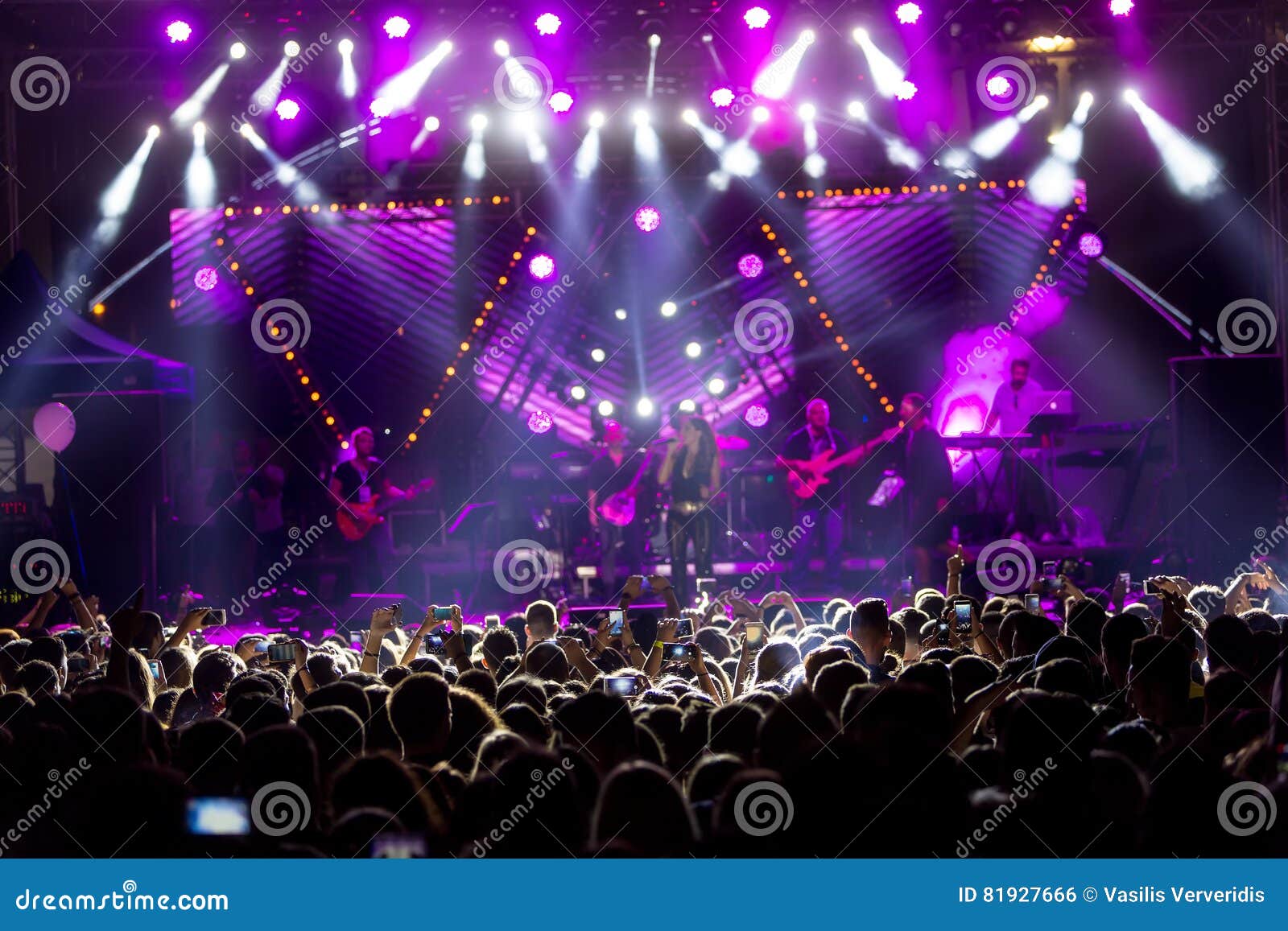 Silhouettes of Concert Crowd in Front of Bright Stage Lights Editorial ...