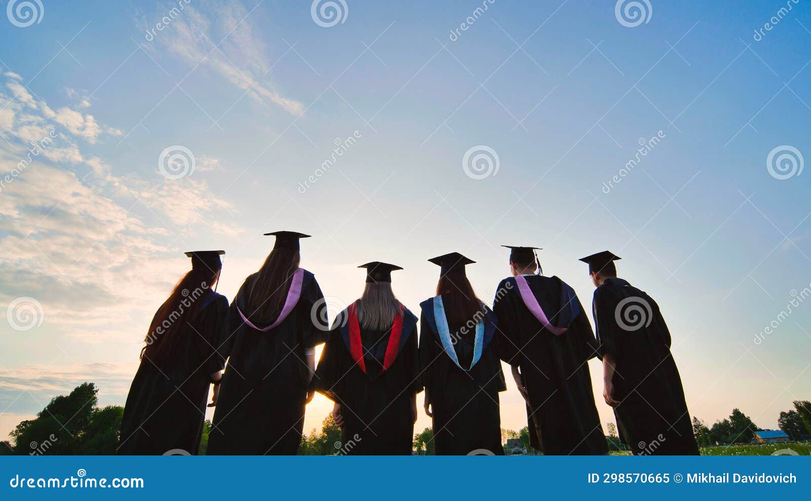 Silhouettes of Graduating Students at Sunset. Stock Image - Image of ...