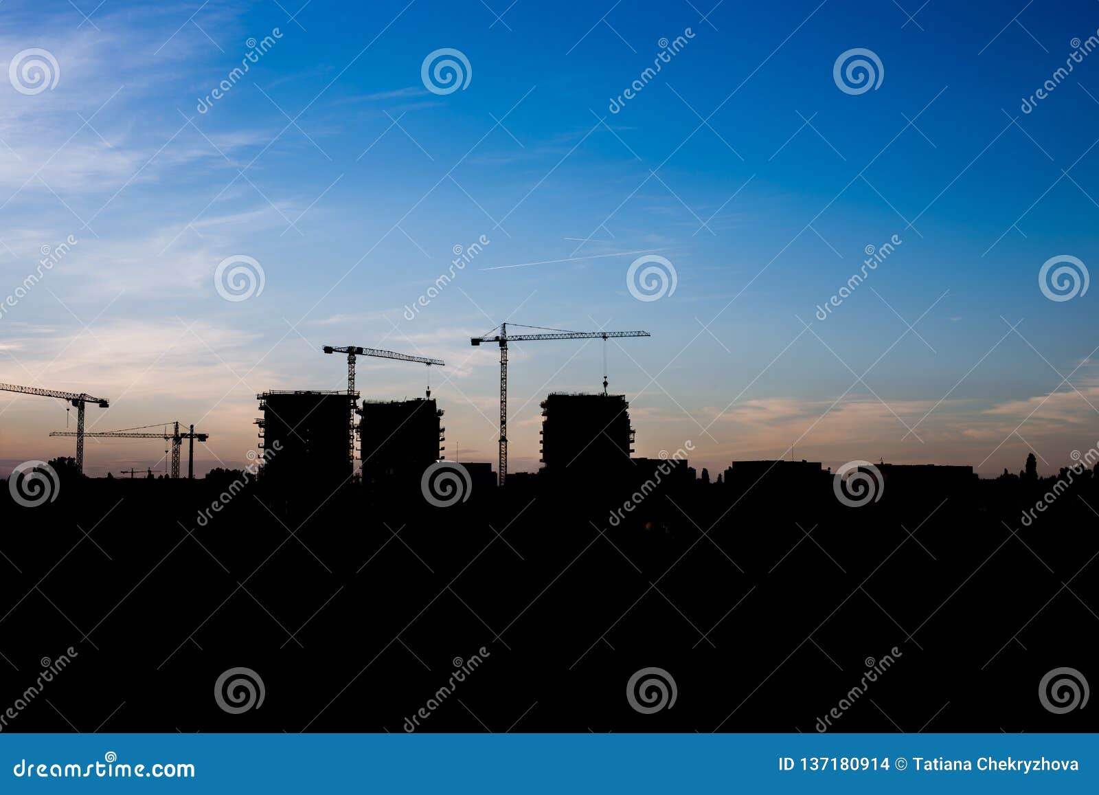 Silhouettes High-rise Buildings Under Construction on Background of the ...
