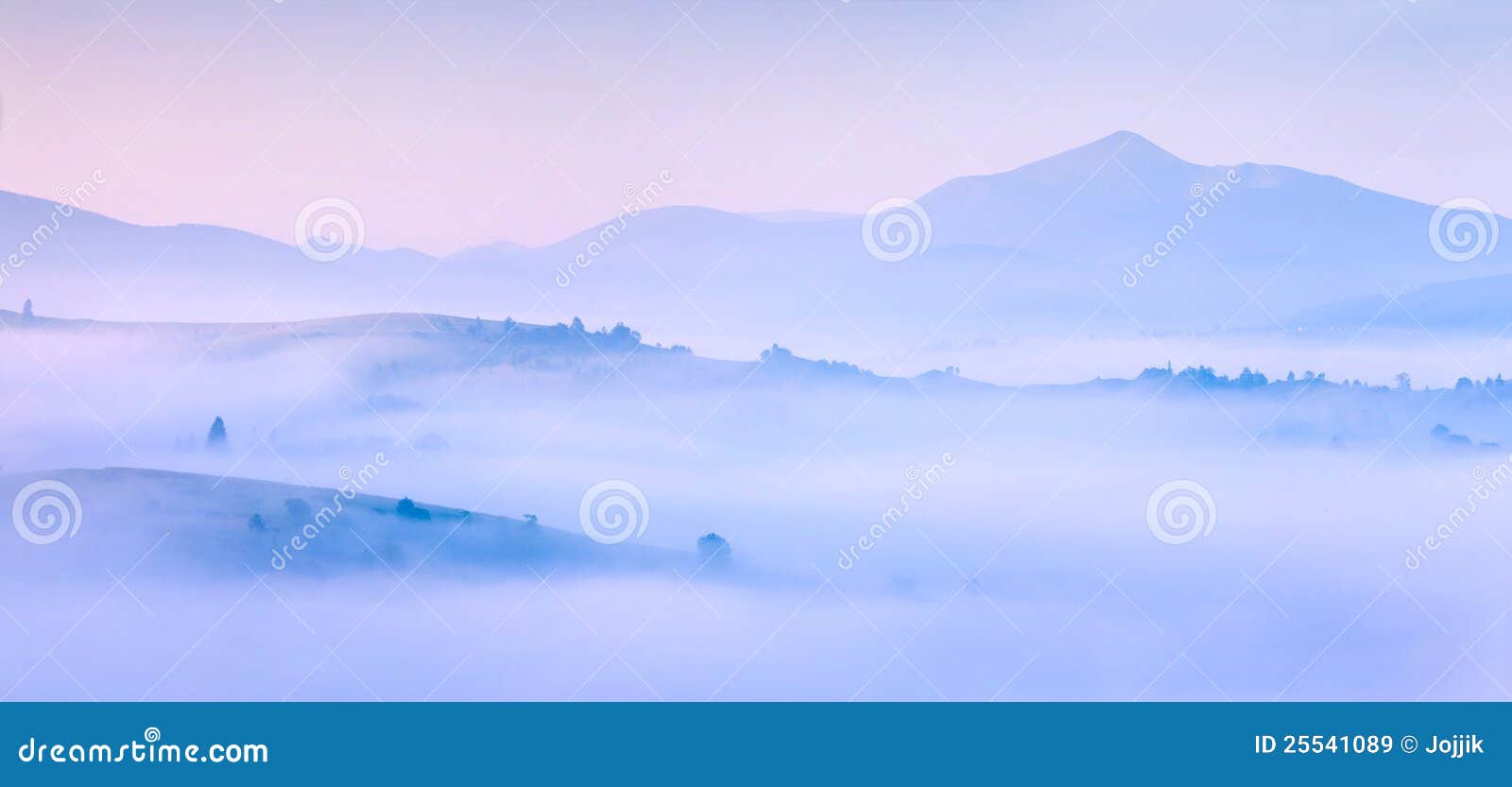 Silhouettes of the Mountains in the Morning Mist Stock Image - Image of ...