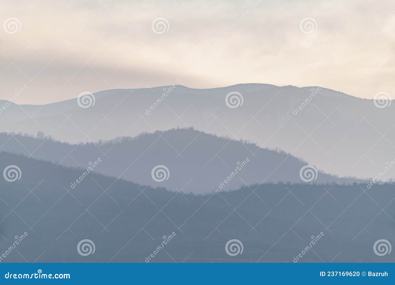 Silhouettes of Mountains in the Sunset Haze Stock Photo - Image of ...
