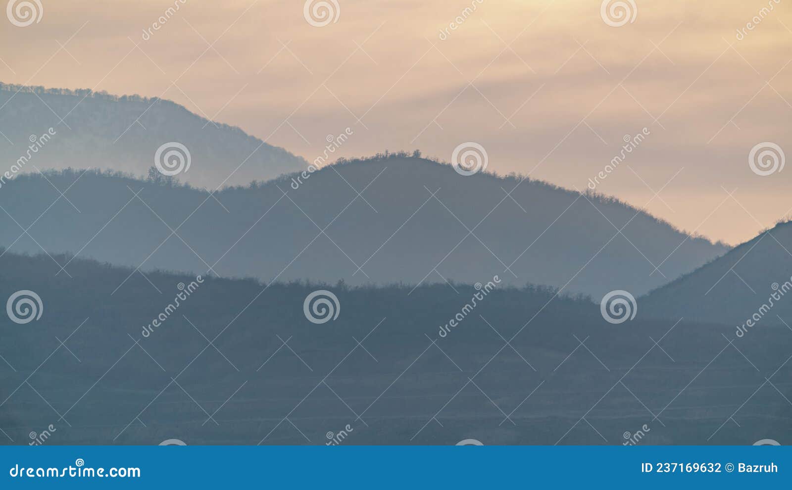 Silhouettes of Mountains in the Sunset Haze Stock Photo - Image of haze ...