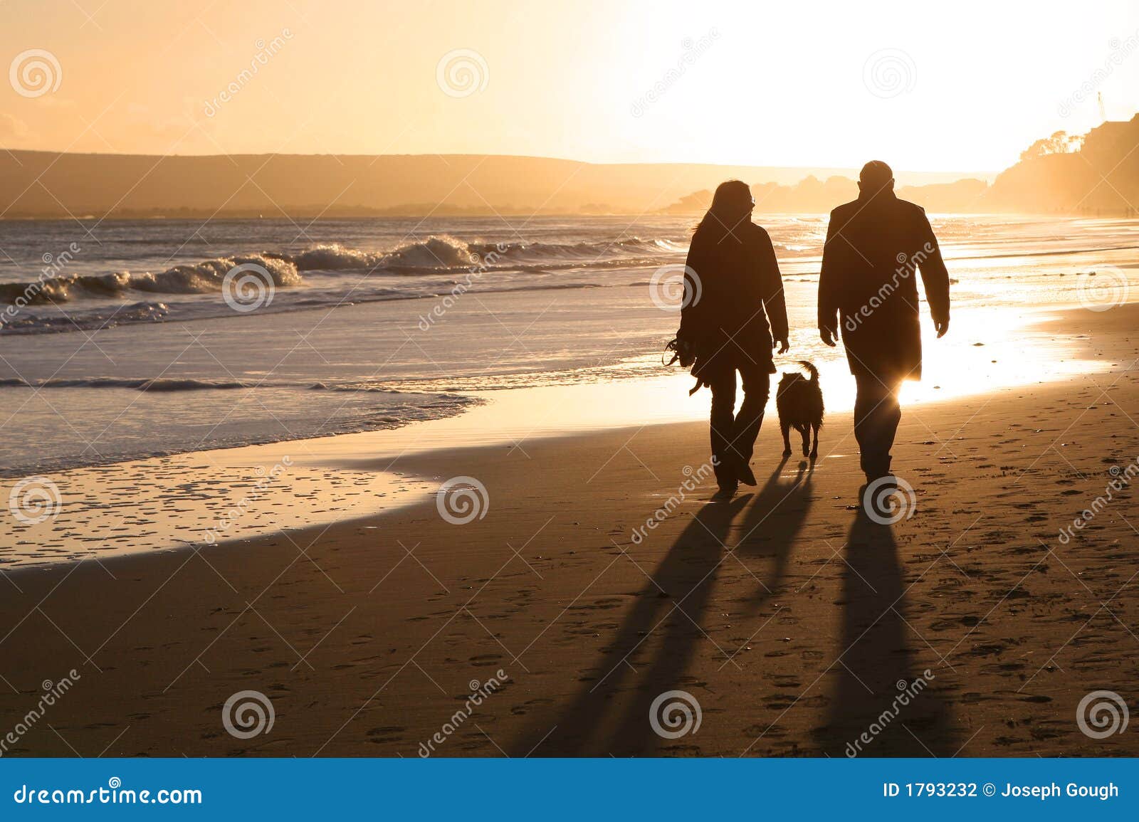 Silhouettes on the Sand stock photo. Image of couple, ocean - 1793232
