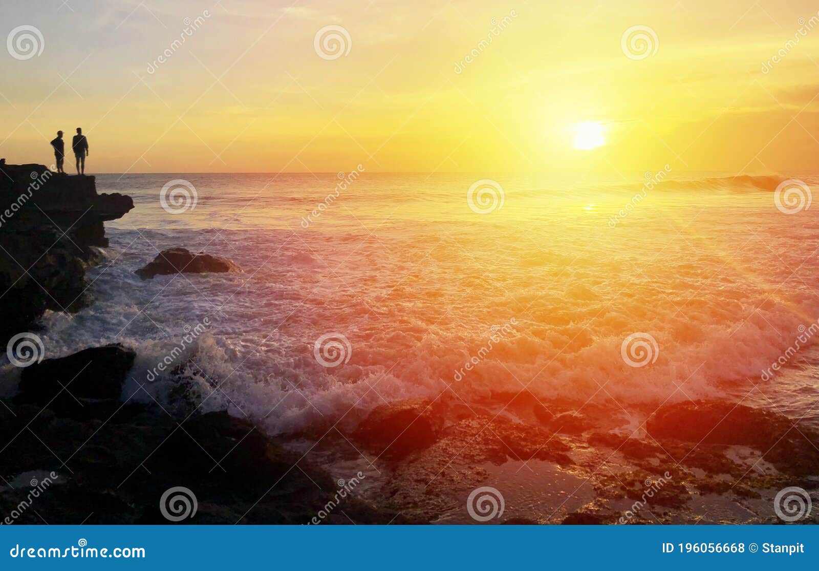 Silhouettes of Two People in Sunset Sun in Bali. Stock Photo - Image of ...