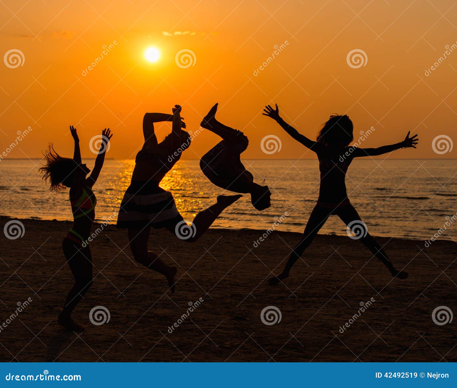 Silhouettes a Young People Having Fun on a Beach Stock Image - Image of ...