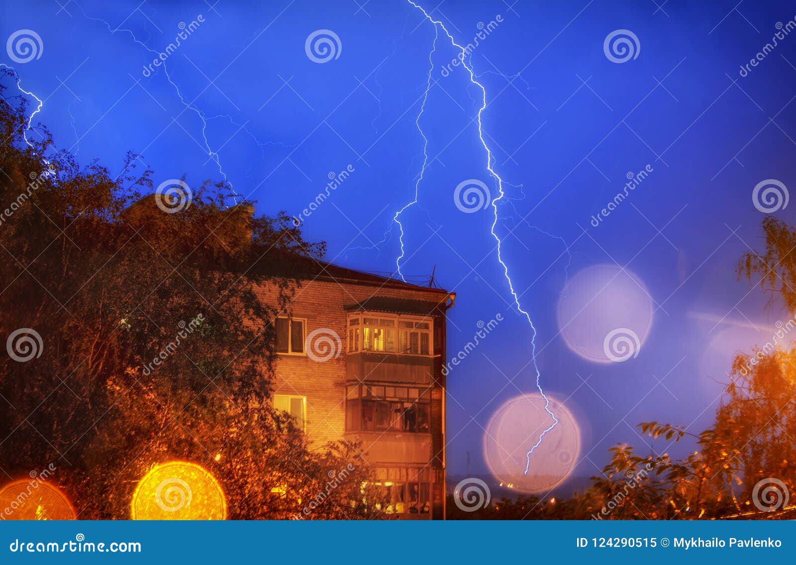 Silhuette of Thunderbolt Over the Buildings and Waterdrops. Stock Image ...