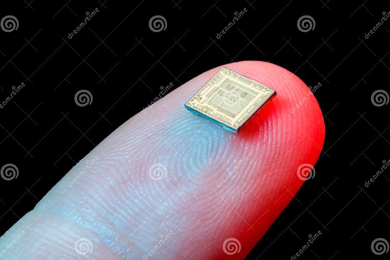 Silicon Microchip on Fingertip Stock Photo - Image of electric, finger ...