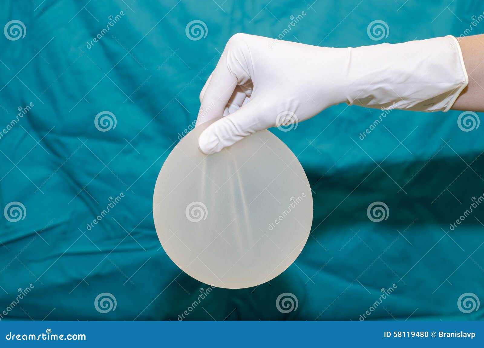 Silicone breast implant stock photo. Image of beauty - 58119480