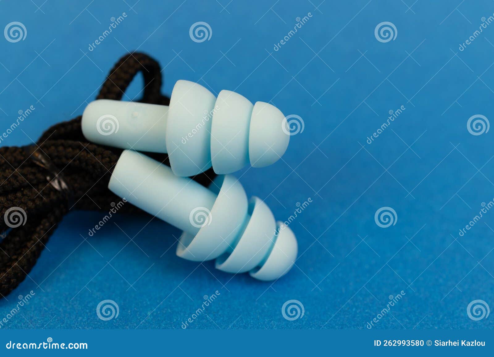 Silicone Ear Plugs for Human Ears on Blue Background Stock Photo ...
