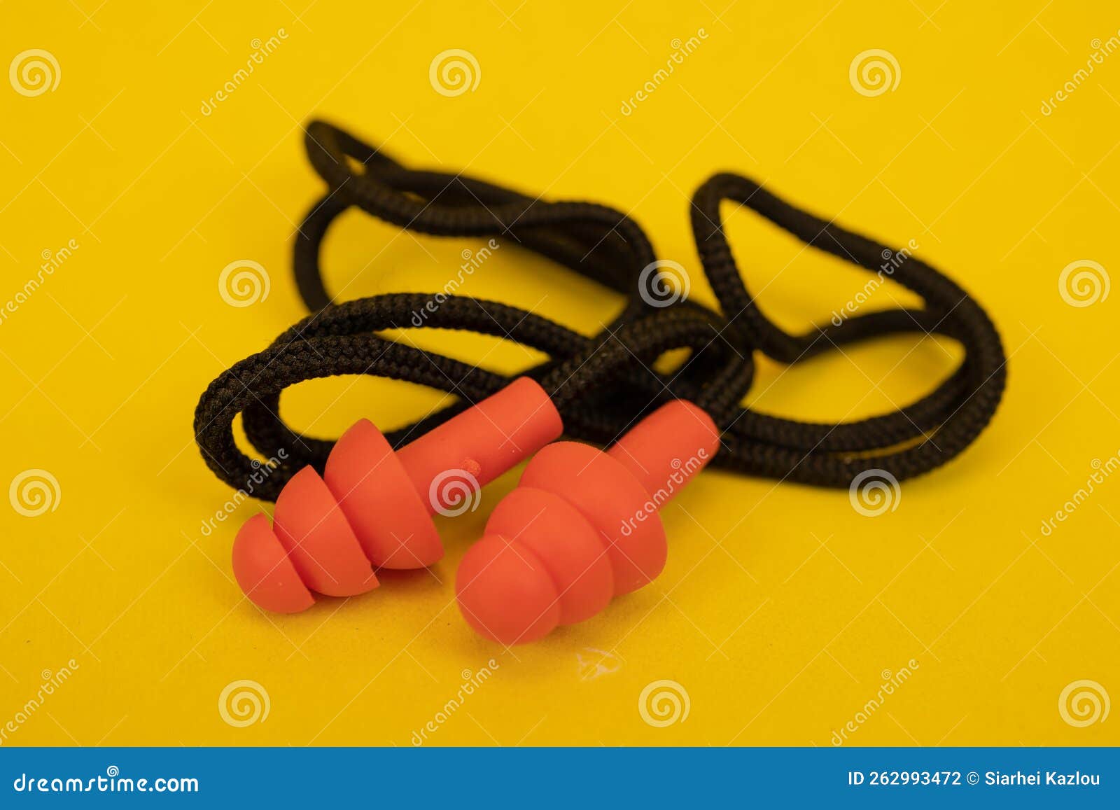 Silicone Ear Plugs for Human Ears on Yellow Background Stock Photo ...