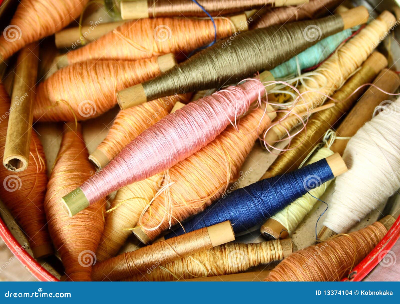 Silk bobbins with colorful stock photo. Image of home - 13374104
