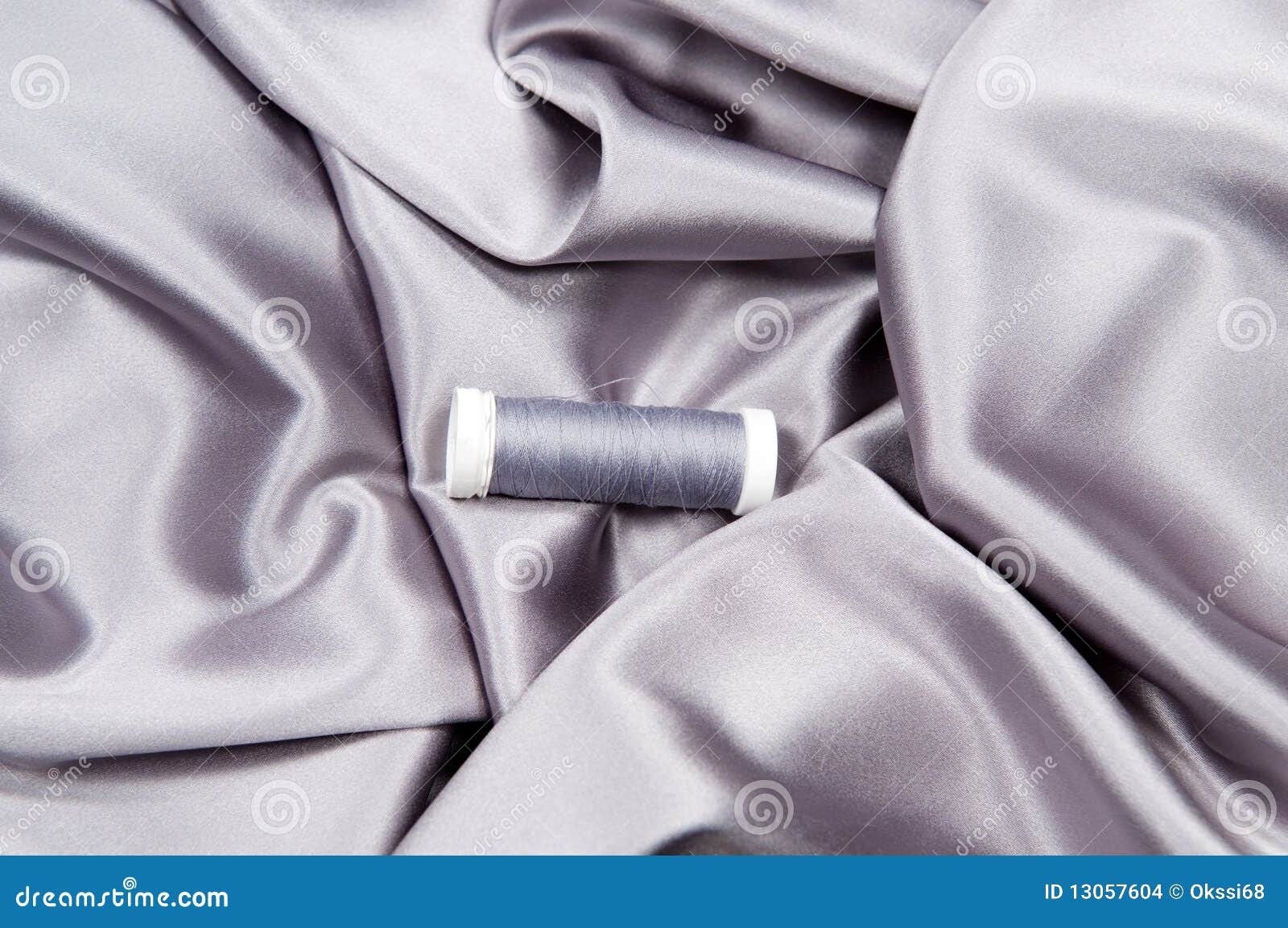Silk fabric and thread stock photo. Image of textile - 13057604