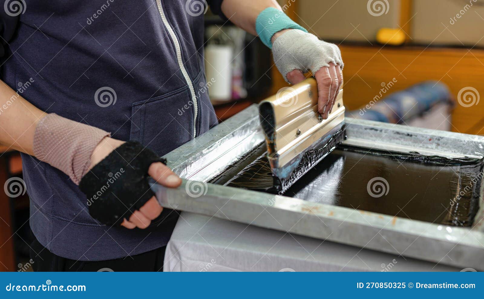 Silk Screen Textile Printery. Male Hand with a Squeegee. Printing by ...