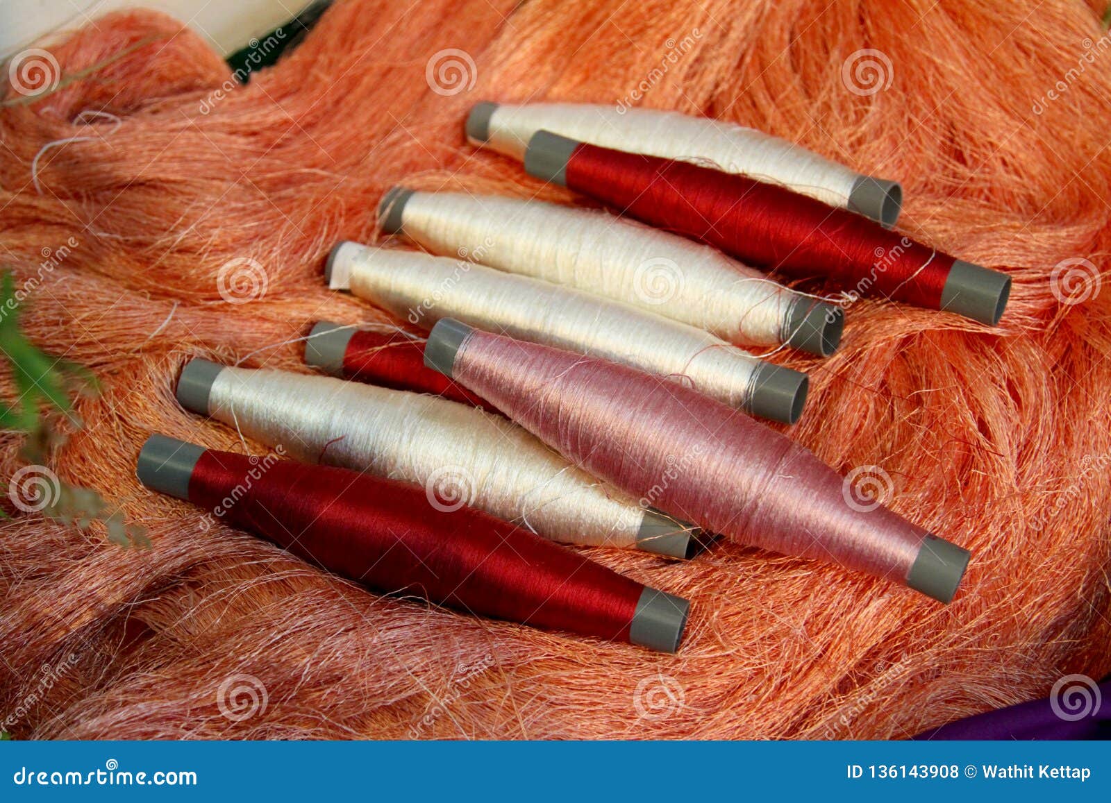 Silk Thread in Roller with Orange Background. Stock Photo - Image of ...