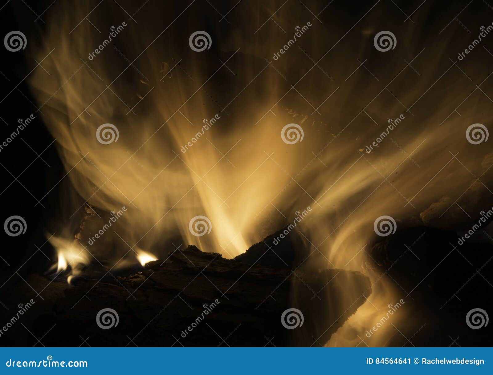 Silky Flames and Curling Embers Rising from Firelogs Burning Stock ...