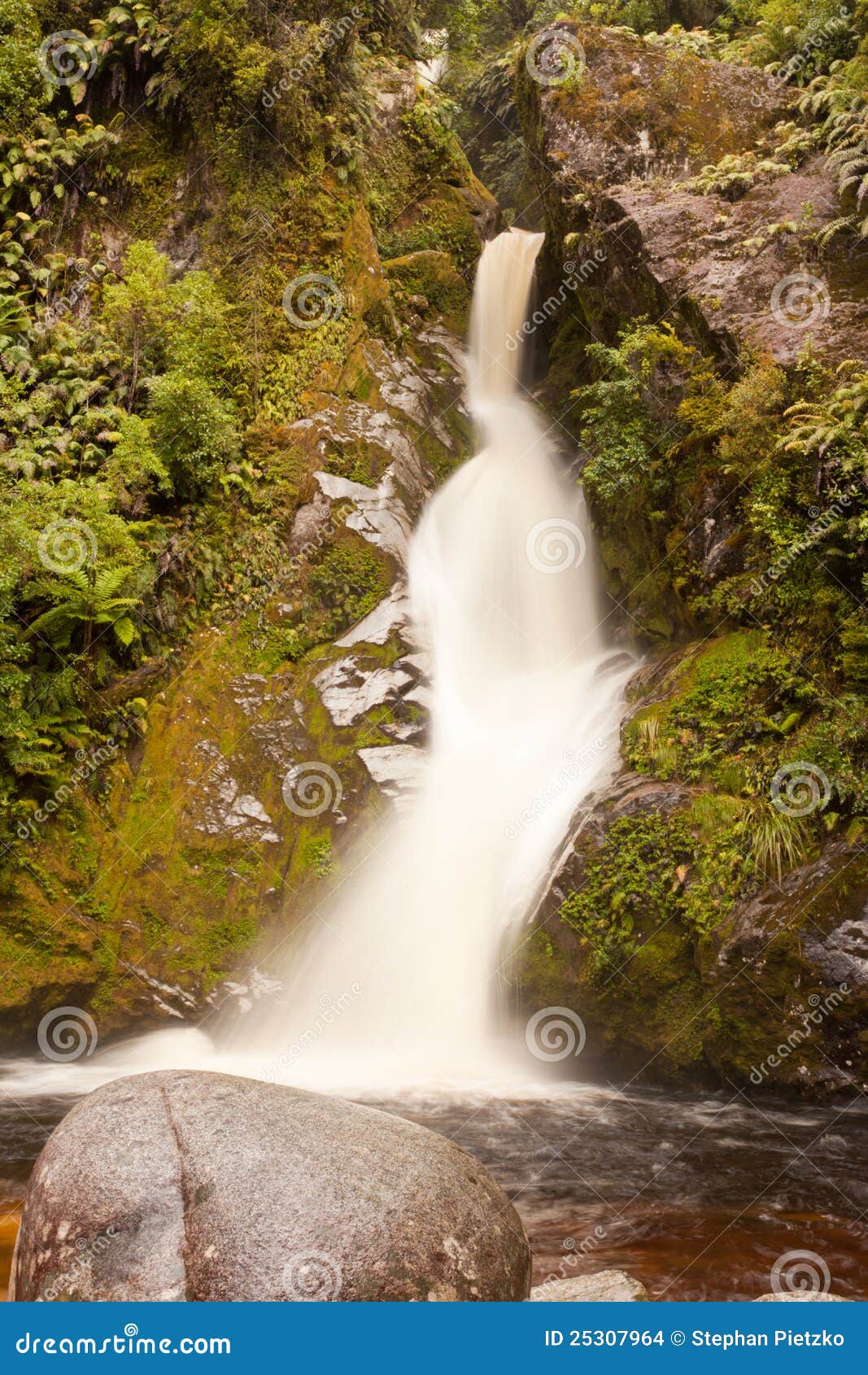 Silky Forest Waterfall Cascading Down Rocky Slope Stock Photo - Image ...
