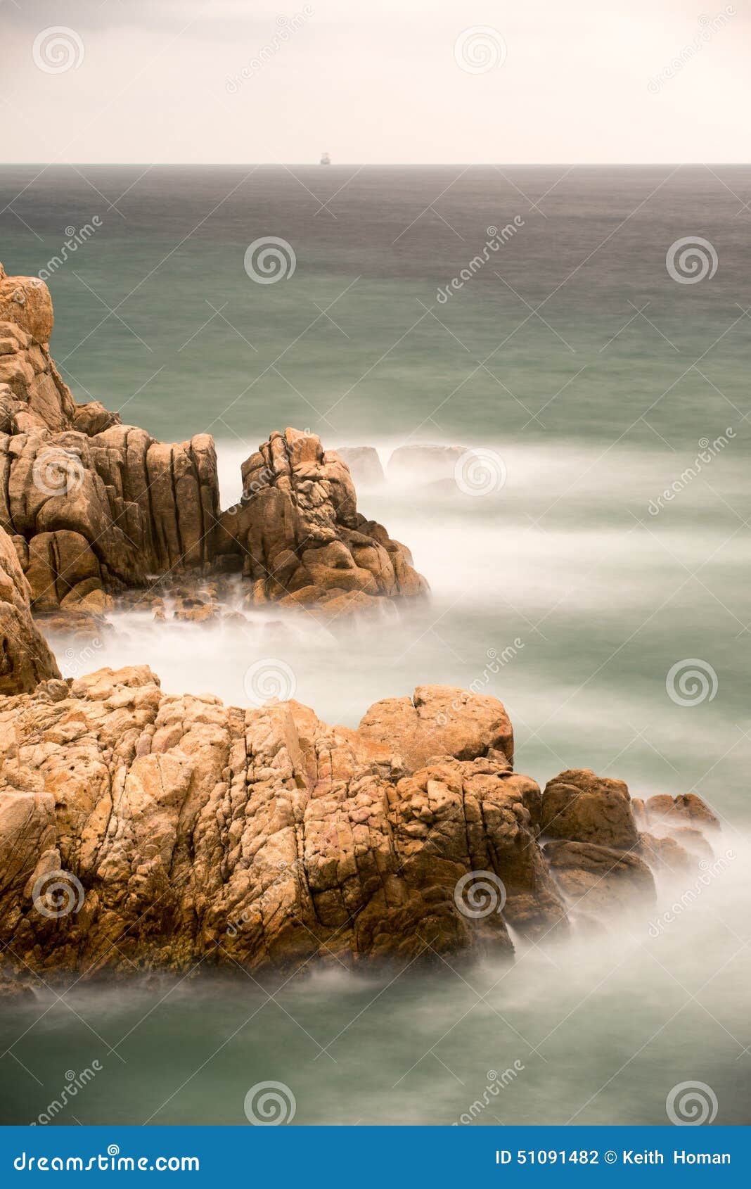 Silky water with rocks stock photo. Image of shore, background - 51091482
