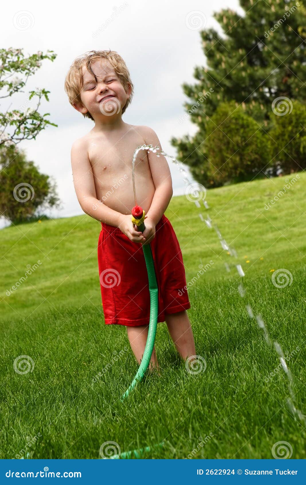 Silly Boy Playing with a Hose Stock Photo - Image of games, refreshing ...