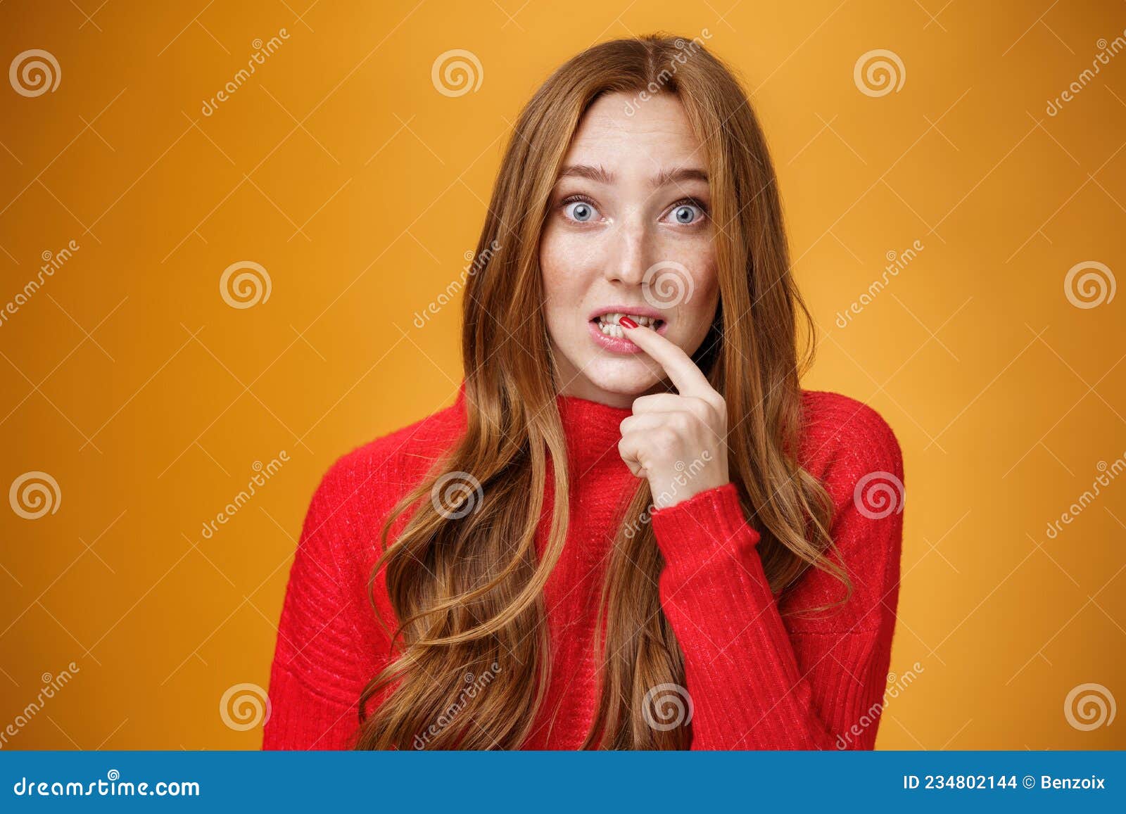 Silly Cute Redhead Woman Making Innocent Oops Expression Holding