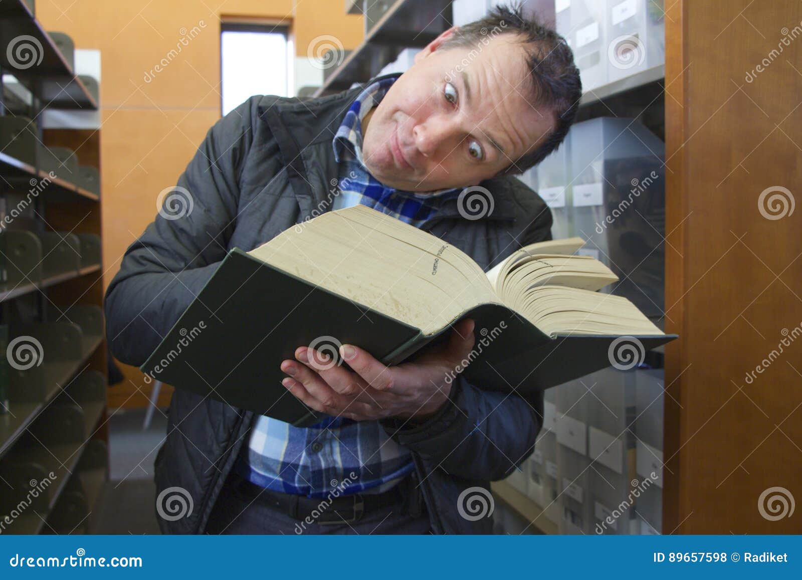 Silly Man Reads a Huge Library Book Stock Photo - Image of white, comic ...