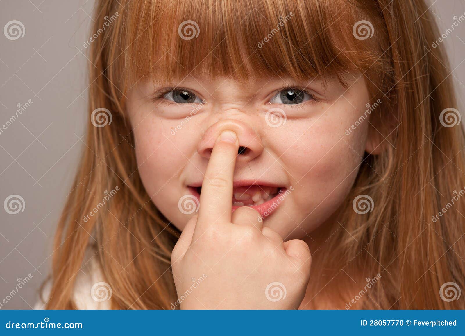 Silly Portrait of an Adorable Red Haired Girl on Grey Stock Photo ...