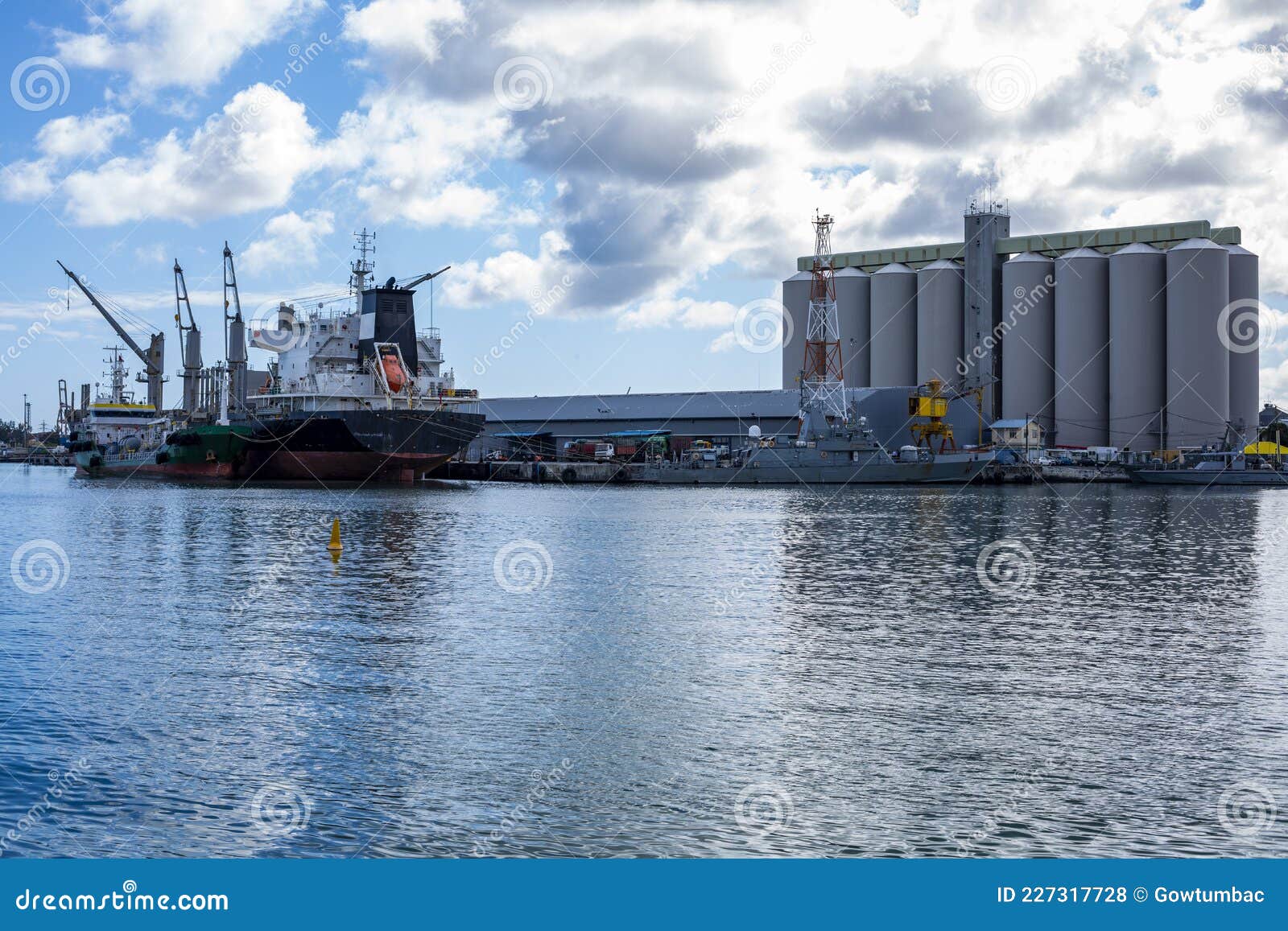 Silo and Cargo Ship at the Harbor of Port Louis, Mauritius. Stock Photo ...