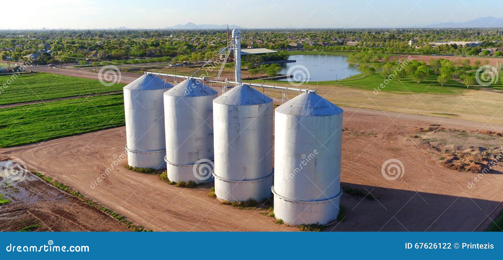 4 Silos by a Field - Aerial Point of View Stock Photo - Image of ...